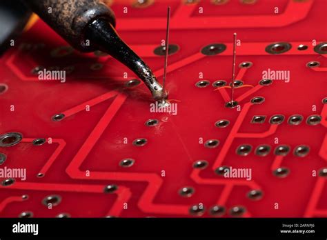 Soldering Process On A Printed Circuit Board Stock Photo Alamy