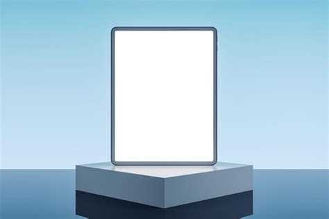 모의 장소 제품 배치 기술 프레젠테이션 개념 3d 렌더링이 있는 받침대 및 밝은 파란색 배경의 빈 흰색 태블릿 프리미엄 사진