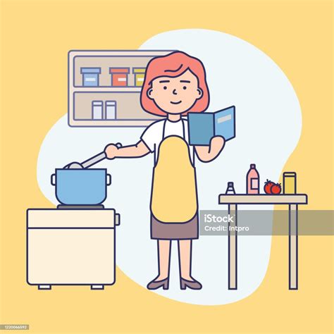 요리 개념 행복한 소녀는 부엌에서 음식을 요리하고 있습니다 여자는 조리법을 읽고 요리하고 좋은 시간을 보내고있다 주부는 팬에