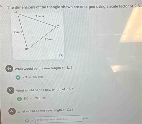 solved the dimensions of the triangle shown are enlarged using a scale