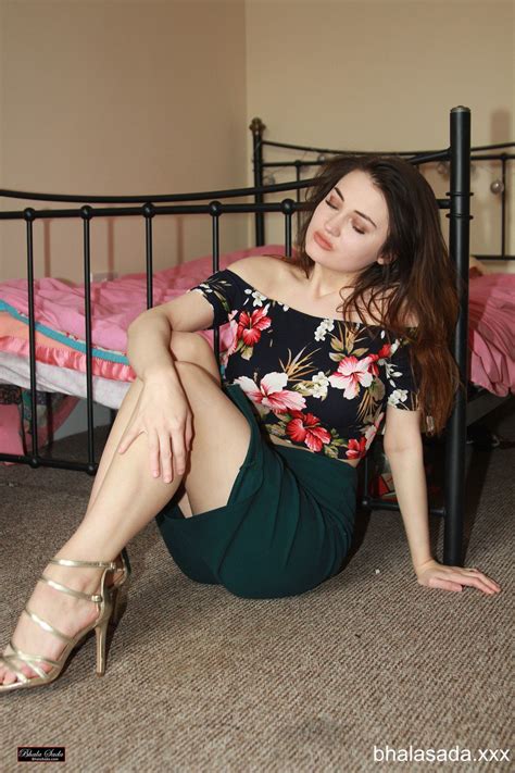 Sweet Chick Posing In Her New Outfit On The Floor 15 Photos