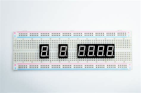 7 segment arduino indicators attached to a breadboard concept of a technical project selective
