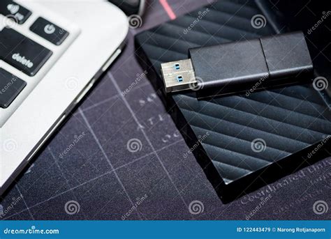 usb flash memory drive plugged into a computer laptop port stock image