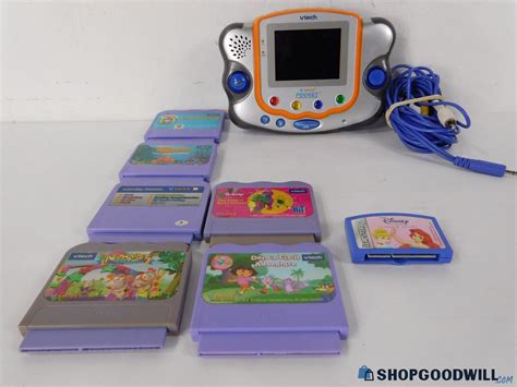 Vtech V Smile Pocket Learning System With 6 Vtech Games And 1 Leapstar Game