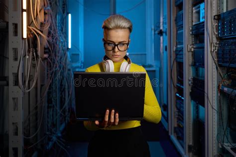 Portrait Of Concentrated Woman Programmer Solving Problem In Data