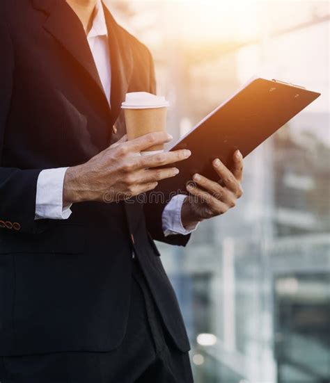 Working Together On Project Two Young Business Colleagues Working On