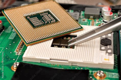 Computer CPU Close Up On The Motherboard Background Socket Of Central Process Unit Connection