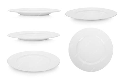 Premium Photo Close Up Of Empty Plates Against White Background