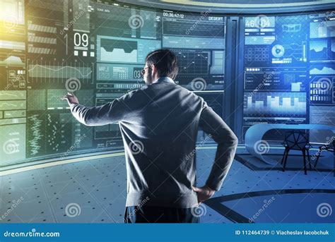 Curious Programmer Pointing To The Screen While Noting An Interesting Detail Stock Image Image