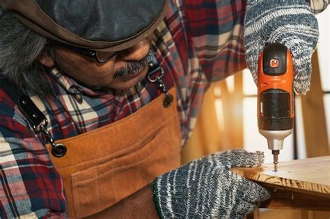 Premium Photo Midsection Of Man Holding Mobile Phone