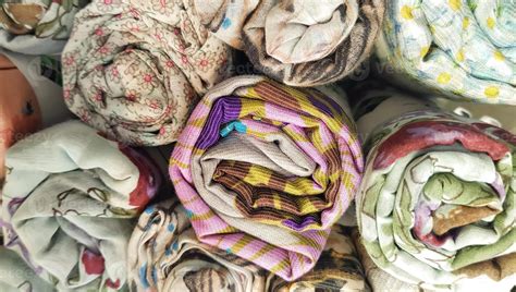 Stacks Of Hijabs Headscarves Of Various Colors In Rolls Photos Of