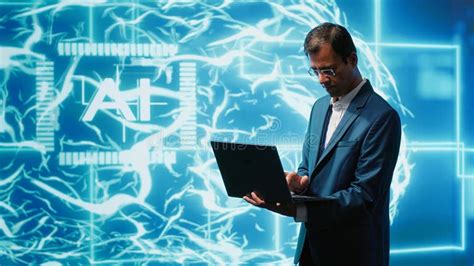 computer scientist using laptop to implement artificial intelligence