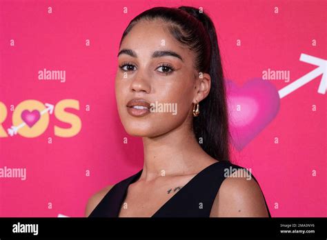 Abisha Poses For Photographers Upon Arrival For The Premiere Of The Film Bros In London