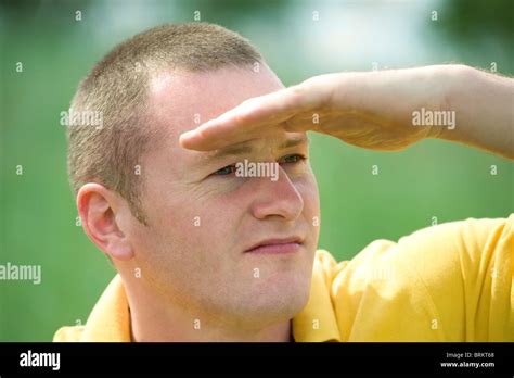 Face Of Man Looking Into The Distance Stock Photo Alamy