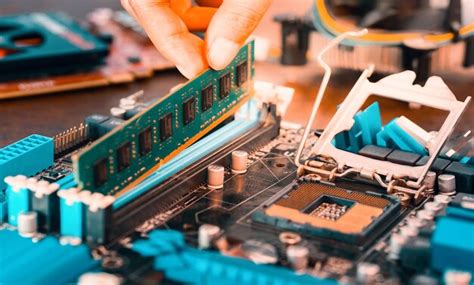 Premium Photo Installing Ram Memory Module On Desktop Computer Motherboard Closeup