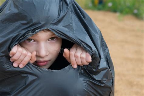 Babe Looks Through The Hole Of A Black Garbage Bag Close Up Stock Image Image Of Alone Eyes