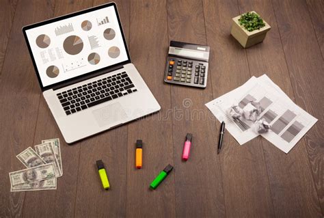 Pie Chart Graph Icons On Laptop Screen With Office Accessories Stock Image Image Of Business