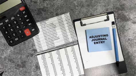 Concept Of Adjusting Journal Entry Write On Sticky Notes Isolated On
