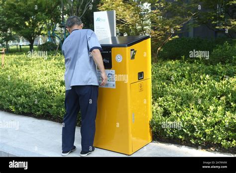 an artificial intelligence ai garbage sorting bin is displayed at