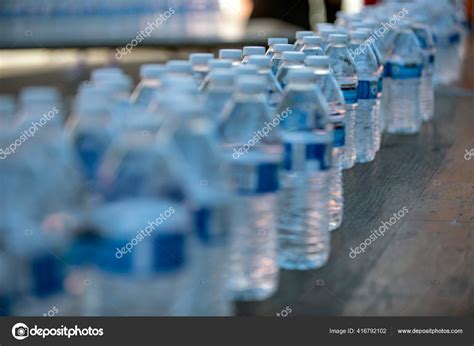 Single Use Plastic Water Bottles Drinking Water Lined Waiting