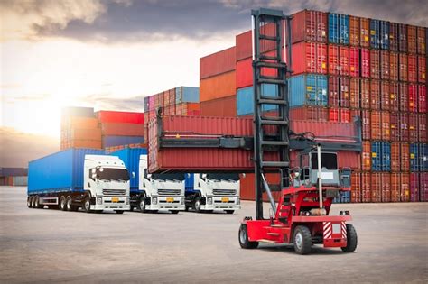Premium Photo Container Crane Tractor Unloading Container Box With Premium Photo Container Crane Tractor Unloading Container Box With