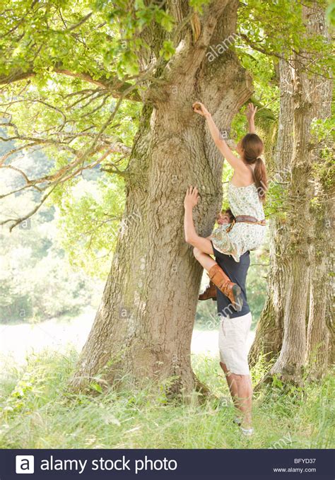 Woman Climbing Tree Stock Photos Woman Climbing Tree Stock Images Alamy
