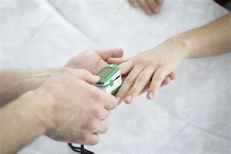 Placing Pulse Oximeter Stock Image F036 5919 Science Photo Library