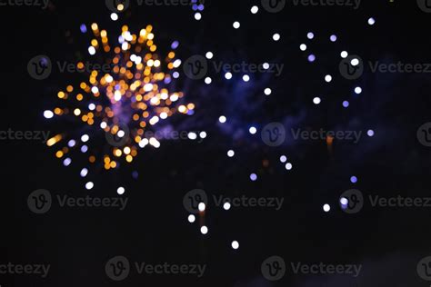Multi Colored Bokeh Spots Of Fireworks On Black Background 22949174