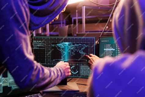 Premium Photo Hackers Using Spyware On Computer Screen While Working