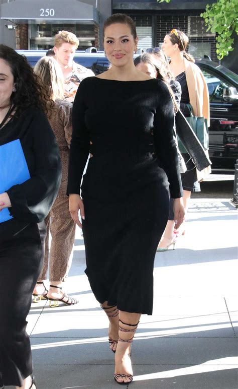 Ashley Graham In A Black Dress Arrives At The Fashion Institute Of