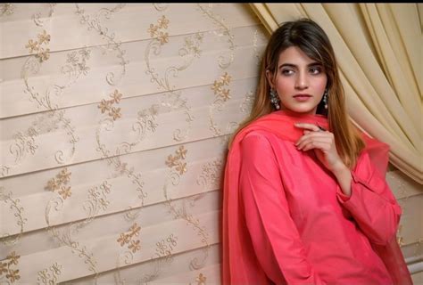 A Woman In A Pink Shirt Posing Eye Looking By Stephen Robert On Youpic