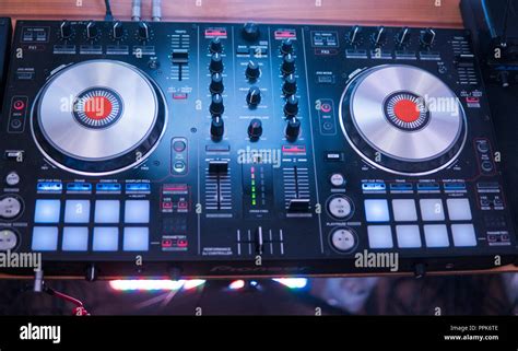DJ Plays And Mix Music On Digital Mixer Controller Close Up DJ Performance Controller Digital