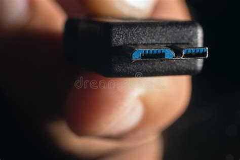 Hand Holding Black Micro USB Cable Man S Hand Holds A USB Connector Closeup Man Hand