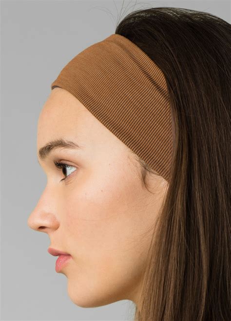 A Recycled Polyester Blend With Moisture Wicking Mesh Liner The Reversible Headband Lets You