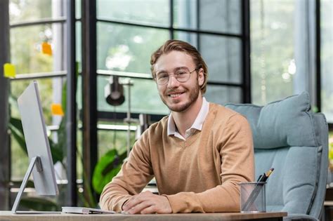 Premium Photo Portrait Of A Successful Young Man Programmer It