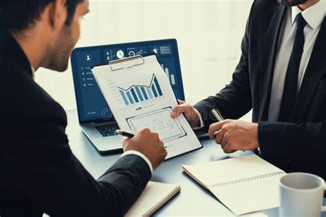 Busy Analyst Team Discussing Financial Data On Laptop Fervent Stock Image Image Of Document