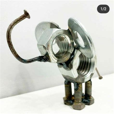 Металева статуетка у вигляді слона із цвяхів та болтів — ціна 800 грн у