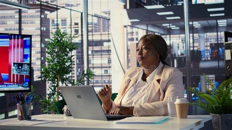 African American Ceo Reviews Data Analytics On A Hologram Reflection Stock Image Image Of