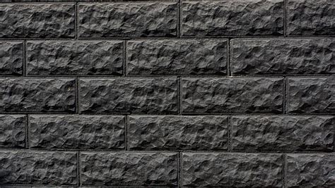 A Structure Built Entirely With Uniform Stones Wallpaper Block Outside