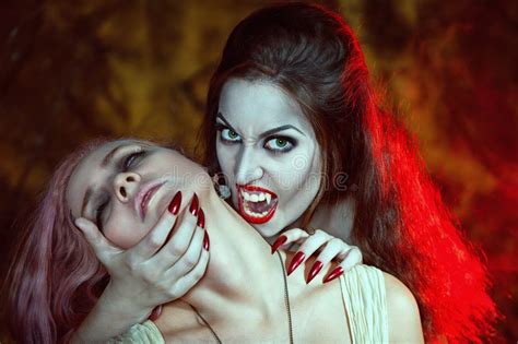 Beautiful Vampire and Her Victim Stock Photo - Image of beauty, eating: 33393910