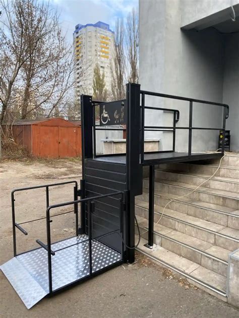 Вертикальный подъемник с платформой ГРАНДМЕТАЛЛ СЕРВИС