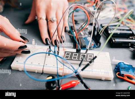 Woman Engineer Connecting Led To Breadboard Stock Photo Alamy