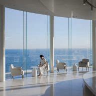 3andwich Design Tops Clifftop Library In China With Circular Pool