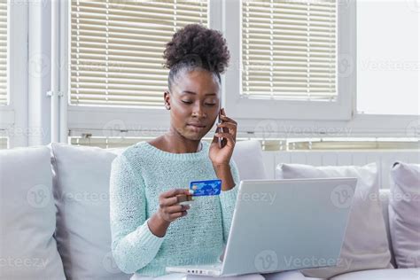 Confused Young Woman Having Problem With Blocked Credit Card Making