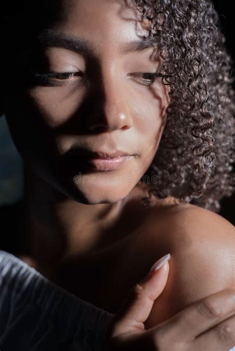 Fashionable Portrait Of A Young Beautiful Hispanic Girl In The Studio