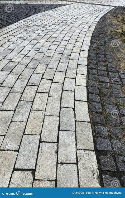 The Texture Of The Old Pedestrian Crossing On The Road With Cracks And Holes Black And White