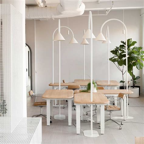 wire grids visually break up open layout of this flatiron office