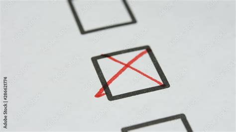 Red Pen Make A X Cross Check Mark Sign In Check Box List On White Paper Closed Up And Selective