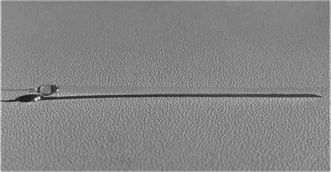 Planar Bragg Sensor Butt Coupled To A Cylindrical Optical Fiber Through