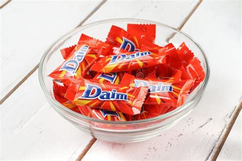 Daim Milk Chocolate And Caramel Candy On A Wooden Table Editorial Photography Image Of